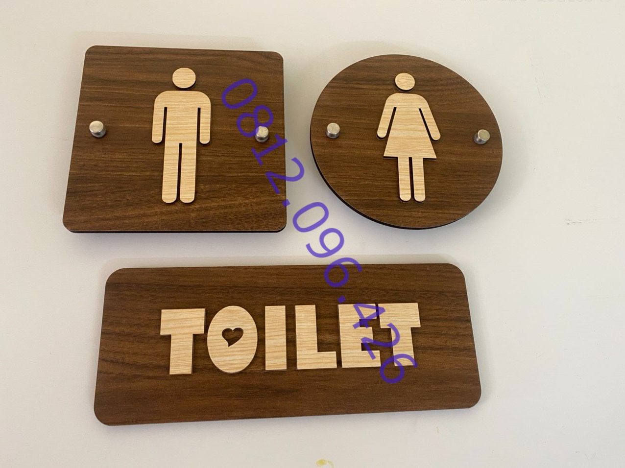 Biển wc nam nữ hình tròn, biển wc nam nữ hoa văn độc đáo mới.